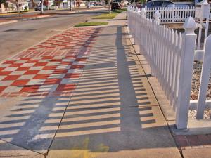 Checkerboard, shadow, and picket fence by goodoleboy