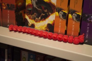 Red Rubber Caterpillar at Indigo in Yorkdale Mall by APlusDesign